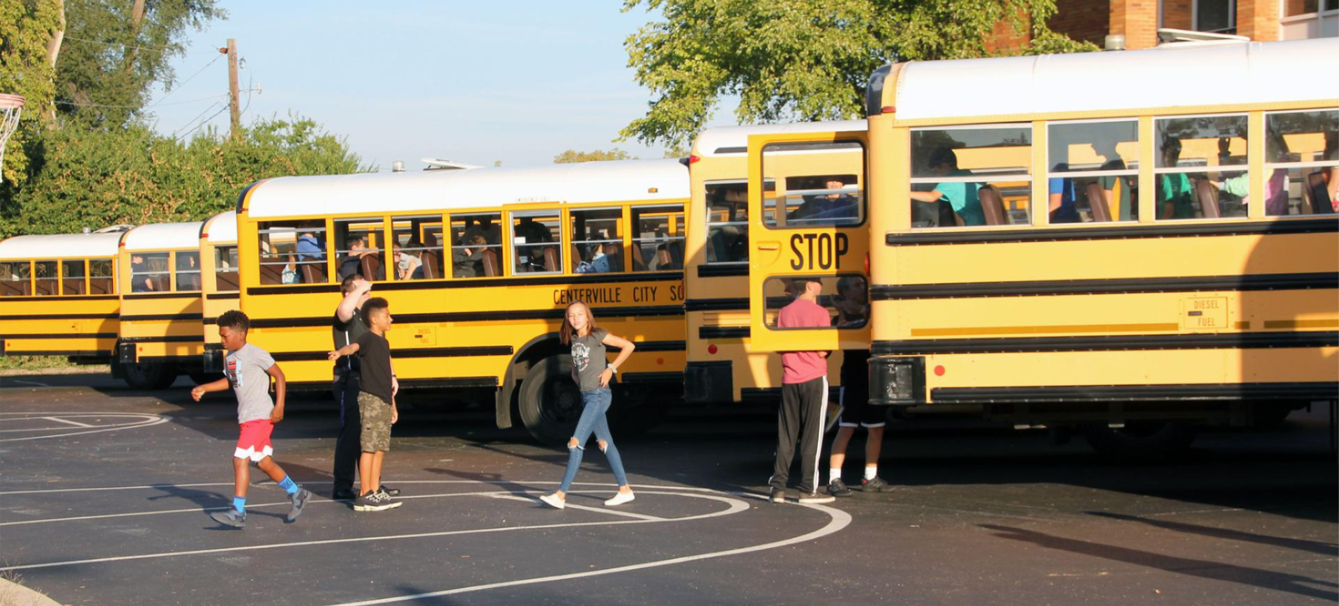 Image of students evacuating buses during drills