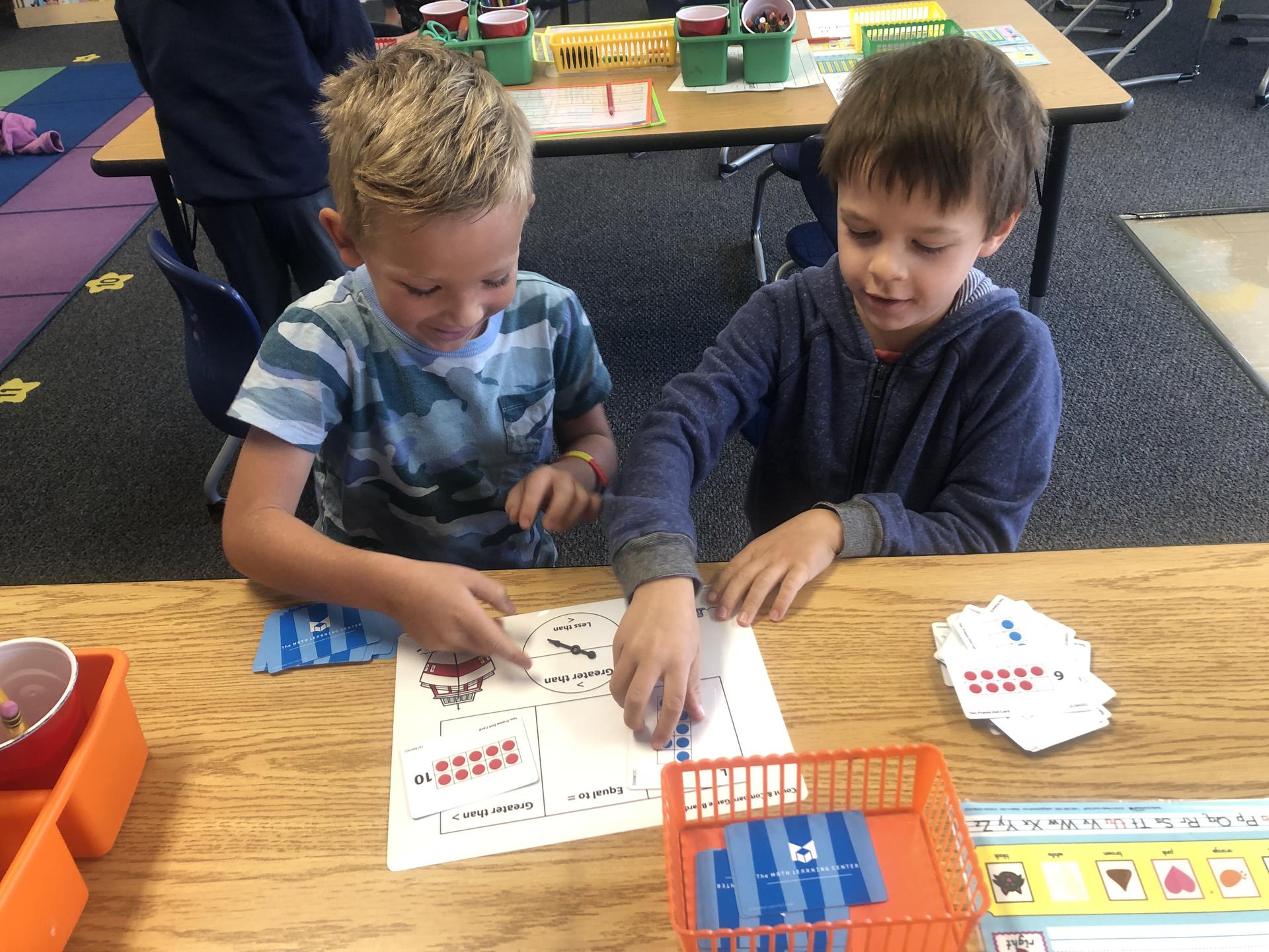 KINDERGARTNERS WORK ON THEIR MATH SKILLS