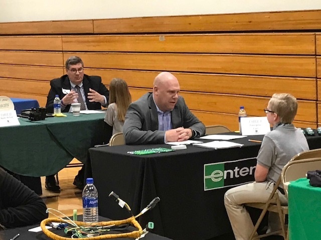 Picture of a student sitting across from an adult from Enterprise ...